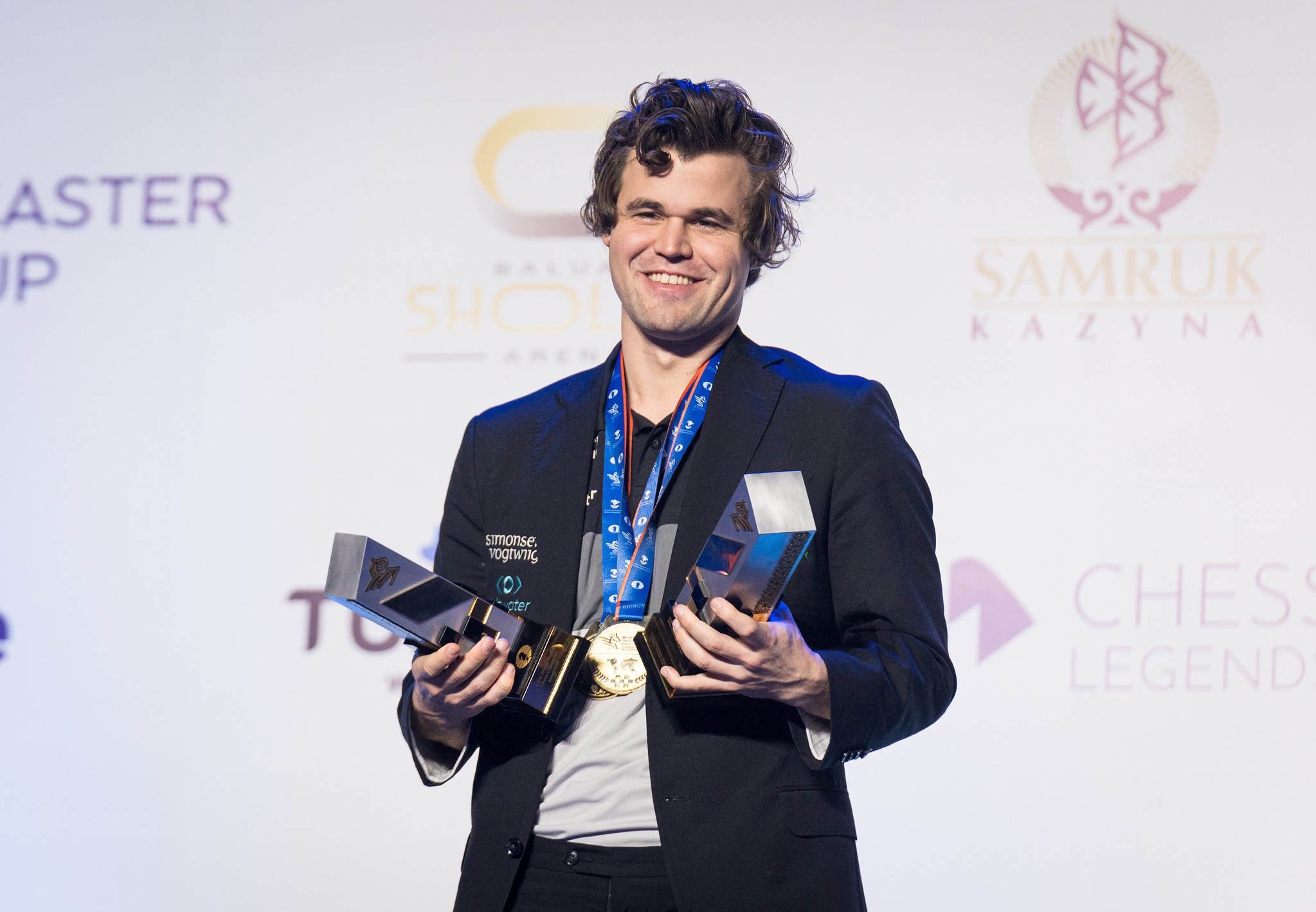 Magnus Carlsen and Bibisara Assaubayeva win the World Blitz Chess ...